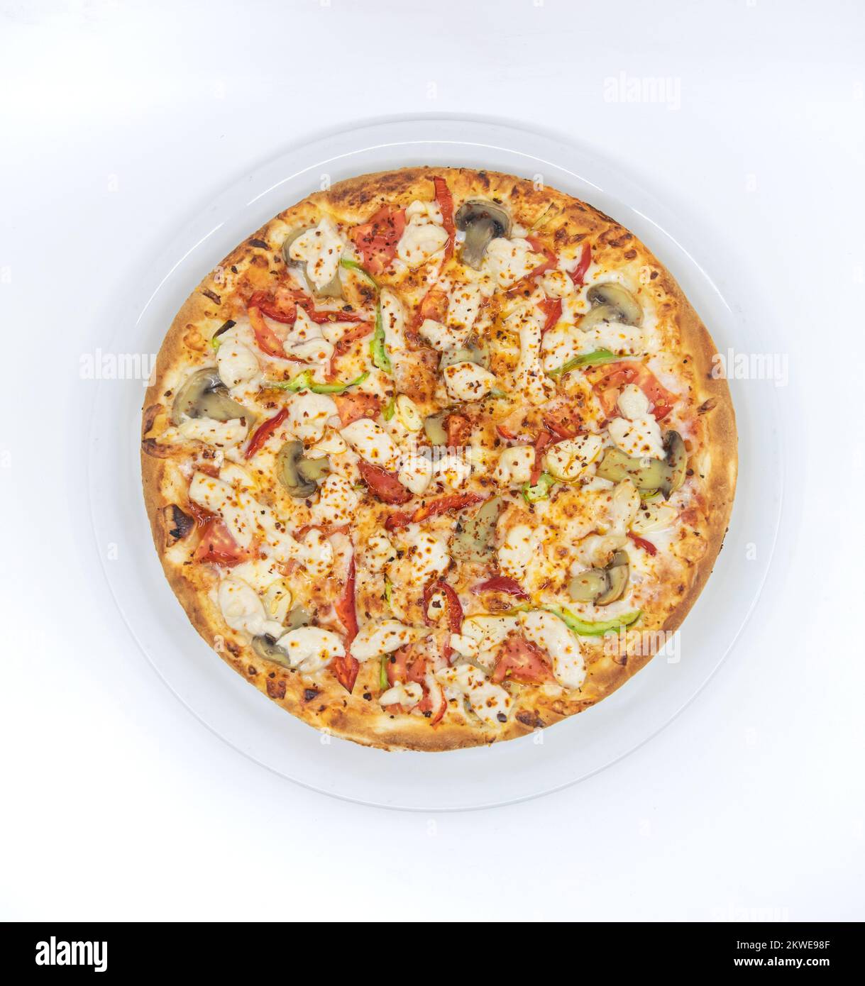 Chicken pizza with vegetables from top view isolated on white ...