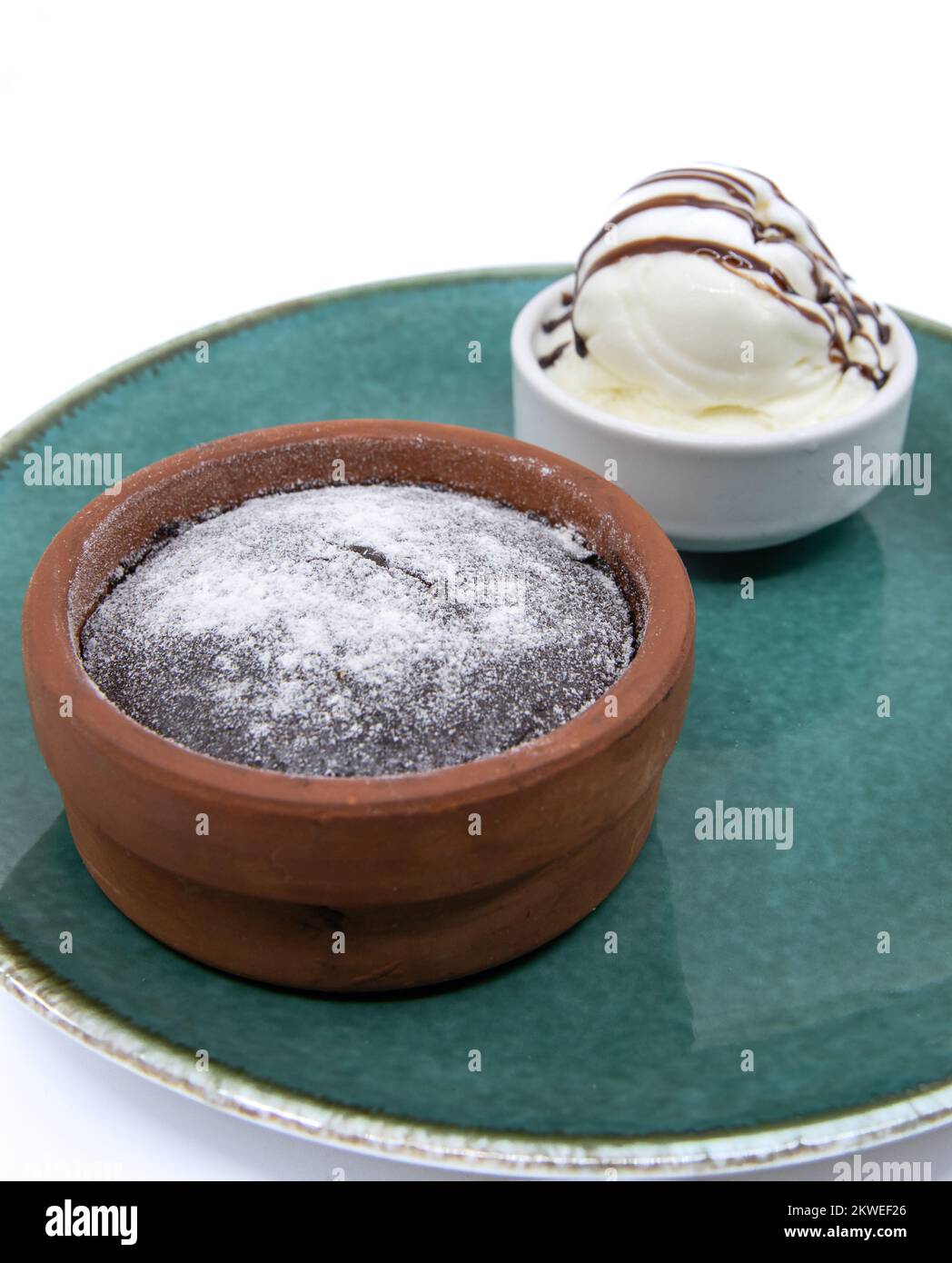Chocolate Souffle with ice cream isolated on white Stock Photo - Alamy