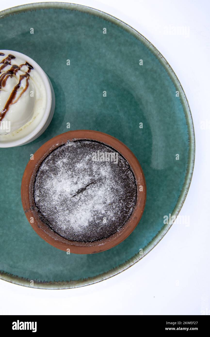 Chocolate Souffle with ice cream isolated on white Stock Photo - Alamy