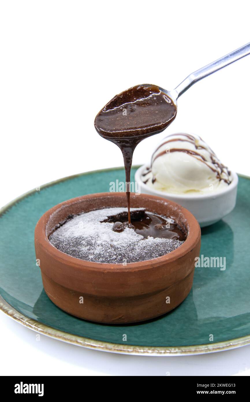 Chocolate Souffle with ice cream isolated on white Stock Photo - Alamy