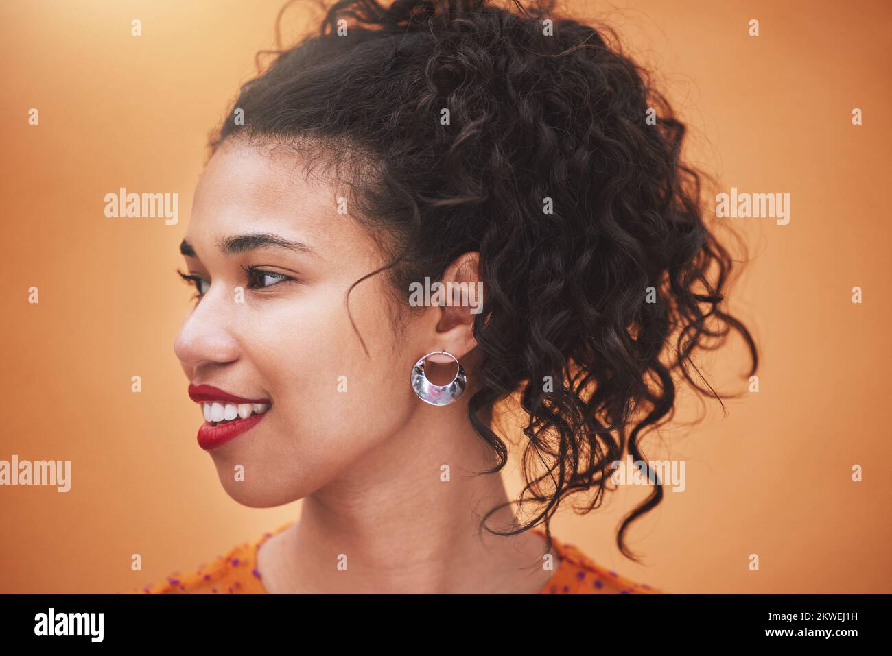 Face of happy young hispanic woman thinking of ideas, beauty and gen z ...