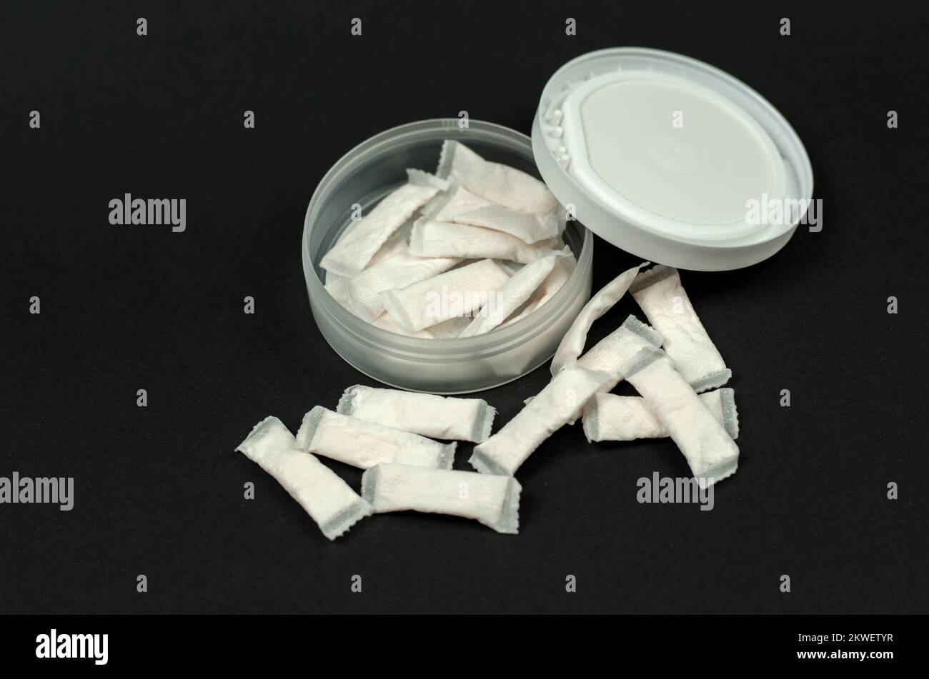 Swedish snus sachets. Open box with snus on a black background Stock ...