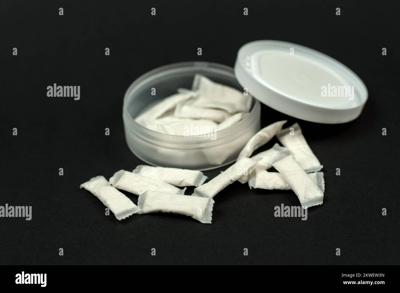Swedish snus sachets. Open box with snus on a black background Stock ...