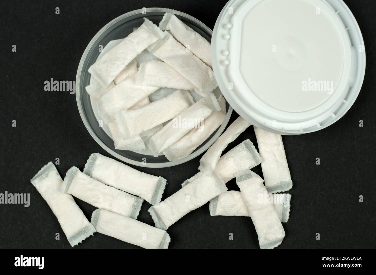 Open box with snus on a black background. Swedish nicotine sachets ...