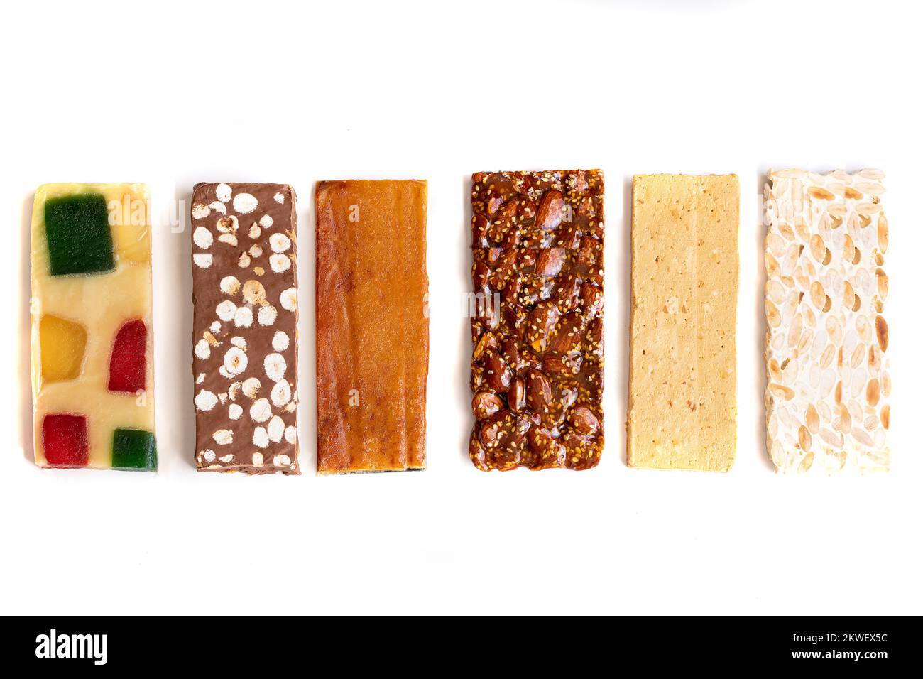 Different Spanish turron or nougat, hard almond, soft almond, chocolate ...