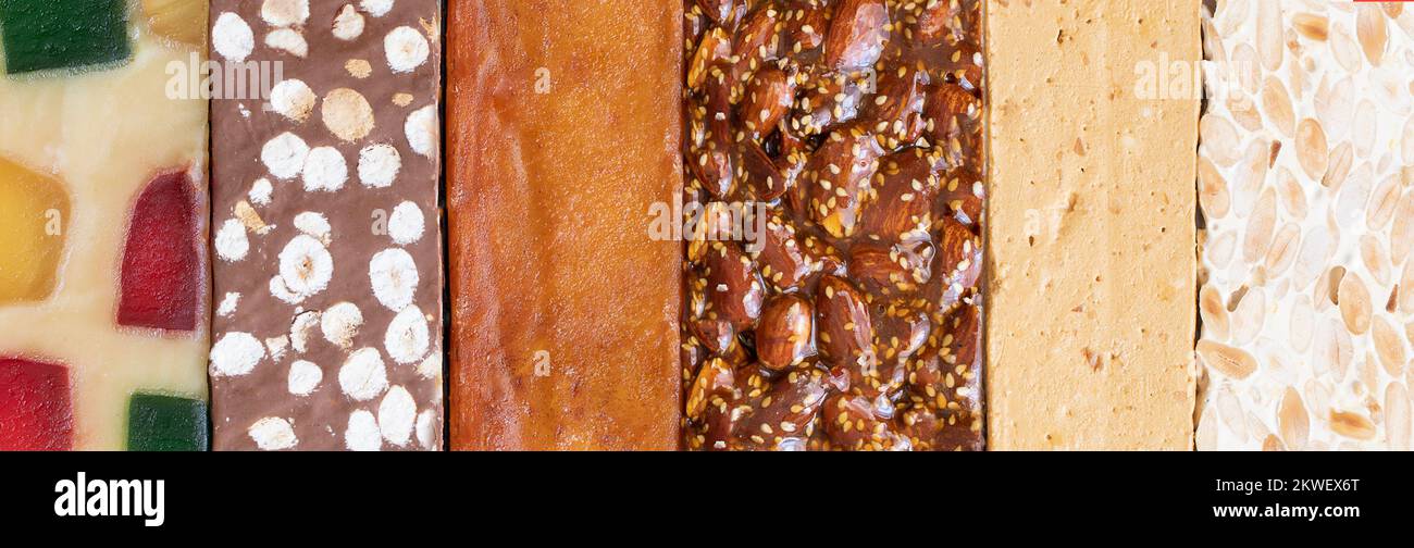 Different Spanish turron or nougat, hard almond, soft almond, chocolate ...
