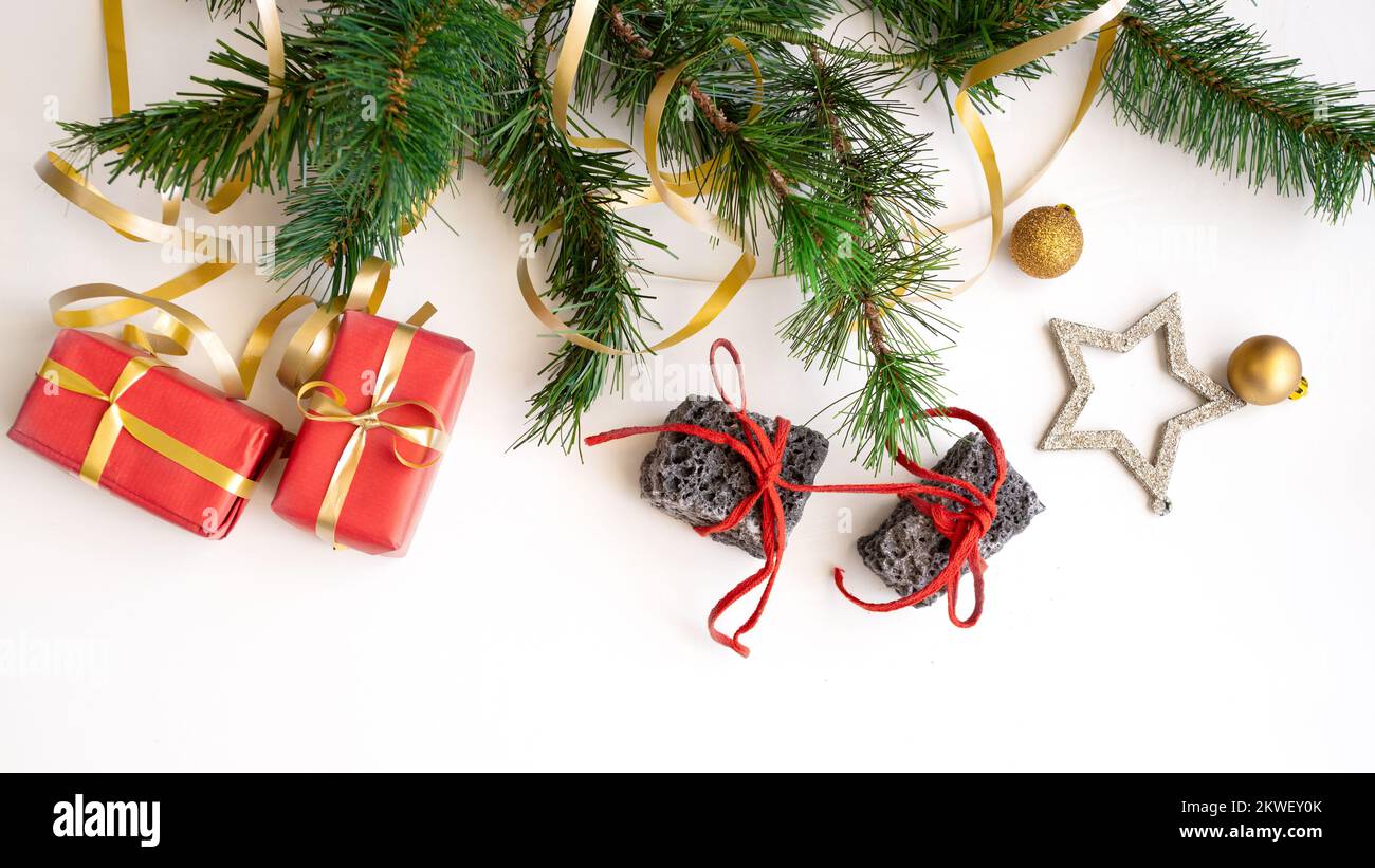 Carbon dulce or Sweet coal candy and red Christmas boxes, typical ...