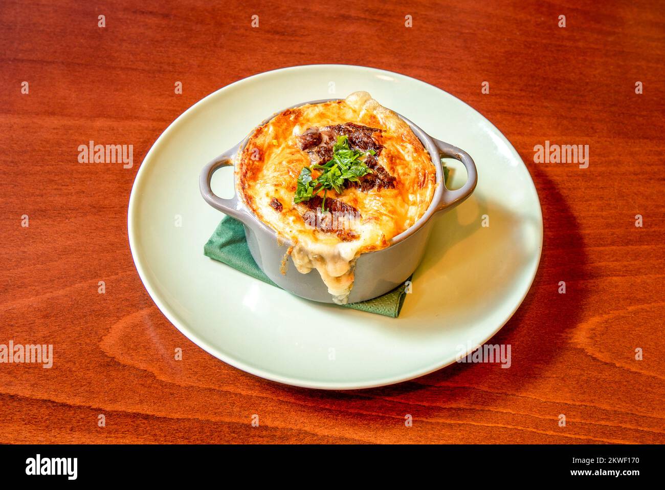 A Beef Stew With Vegetables Based On Broth Thickened With Cassava Fariña Accompanied By White