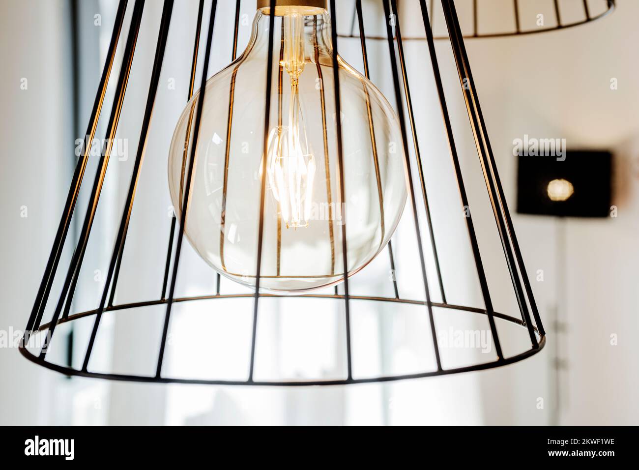 Turned on lamps hanging ceiling hi-res stock photography and images - Alamy