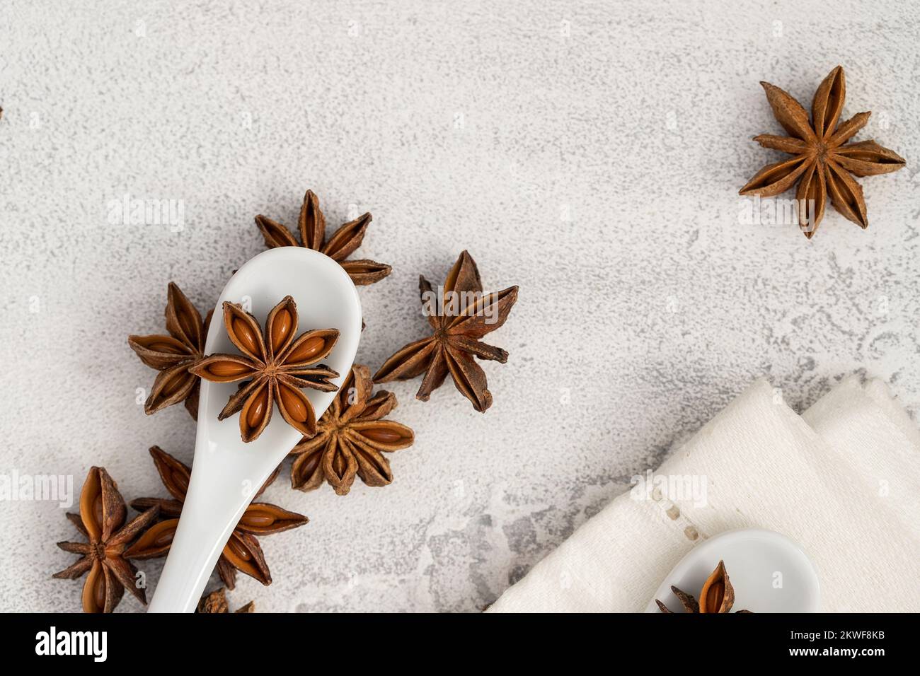 Natural anise star spice on white concrete background.Close up Stock ...