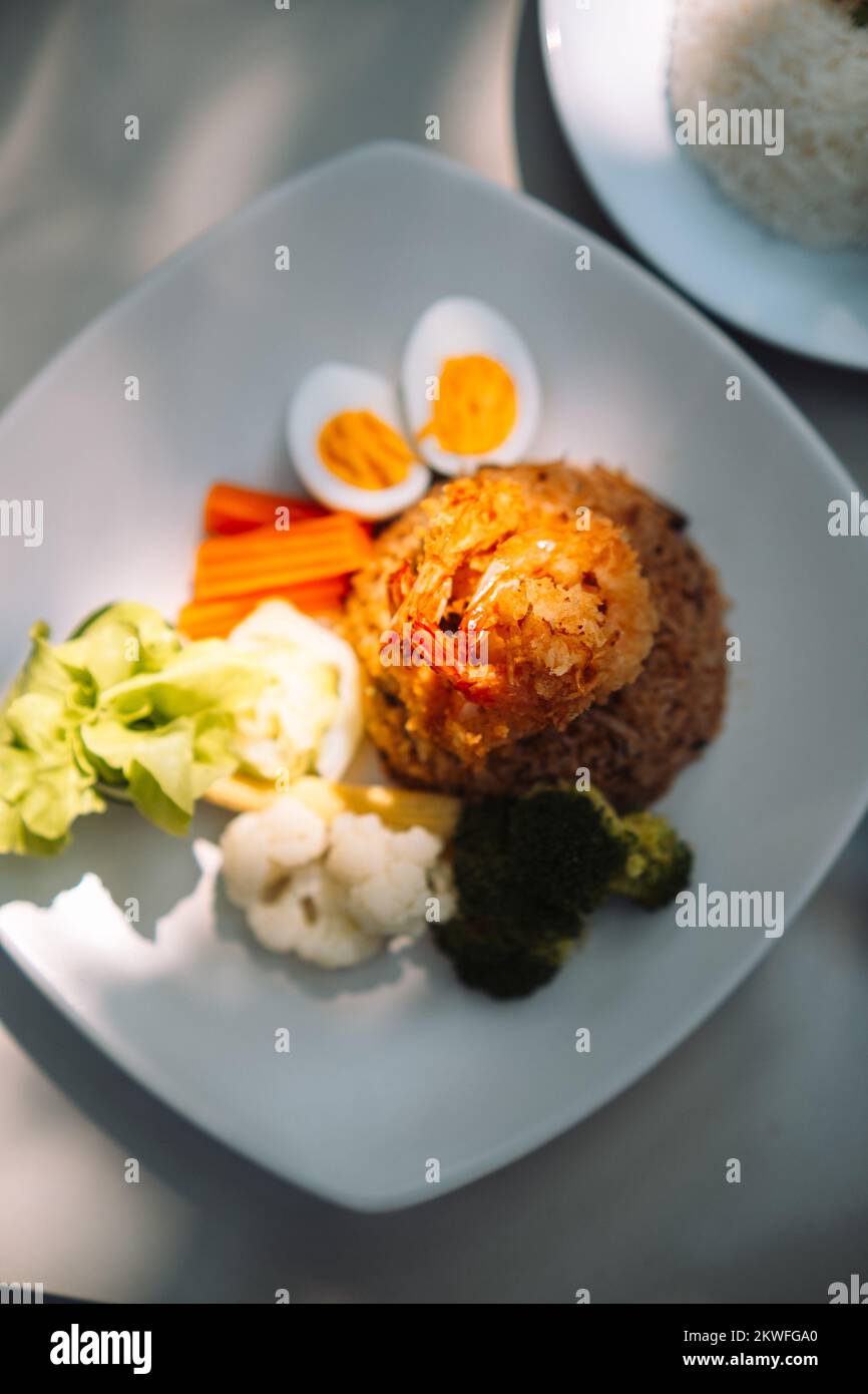 Beautiful thai food on a plate. Spring rolls with spicy sause, chicken ...