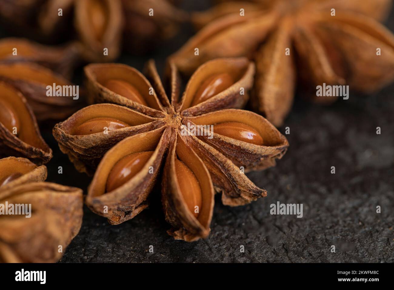 Natural anise star spice on dark concrete background.Close up Stock ...