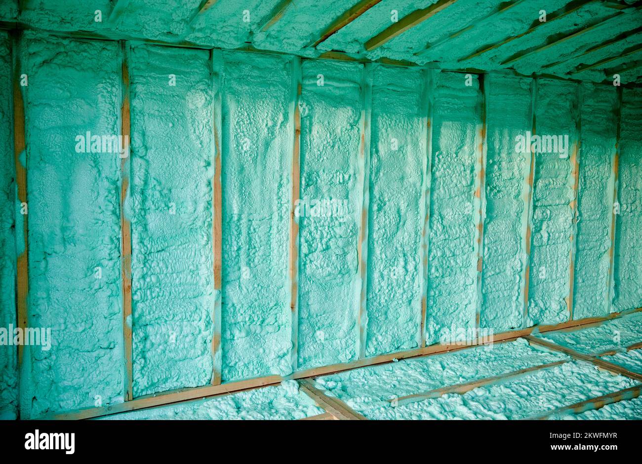 Wooden frame house thermal insulated by polyurethane foam. Construction ...