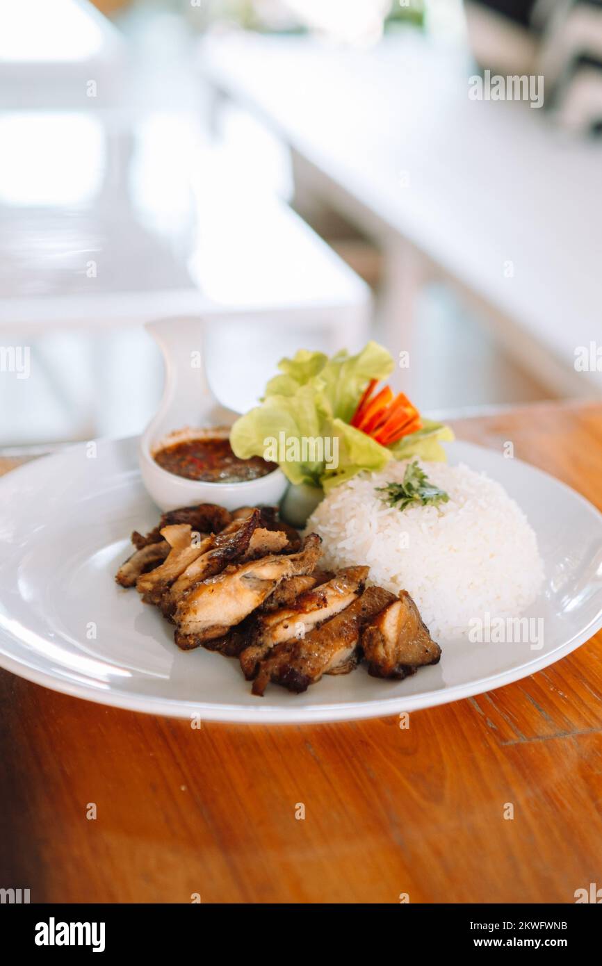 Beautiful thai food on a plate. Spring rolls with spicy sause, chicken ...