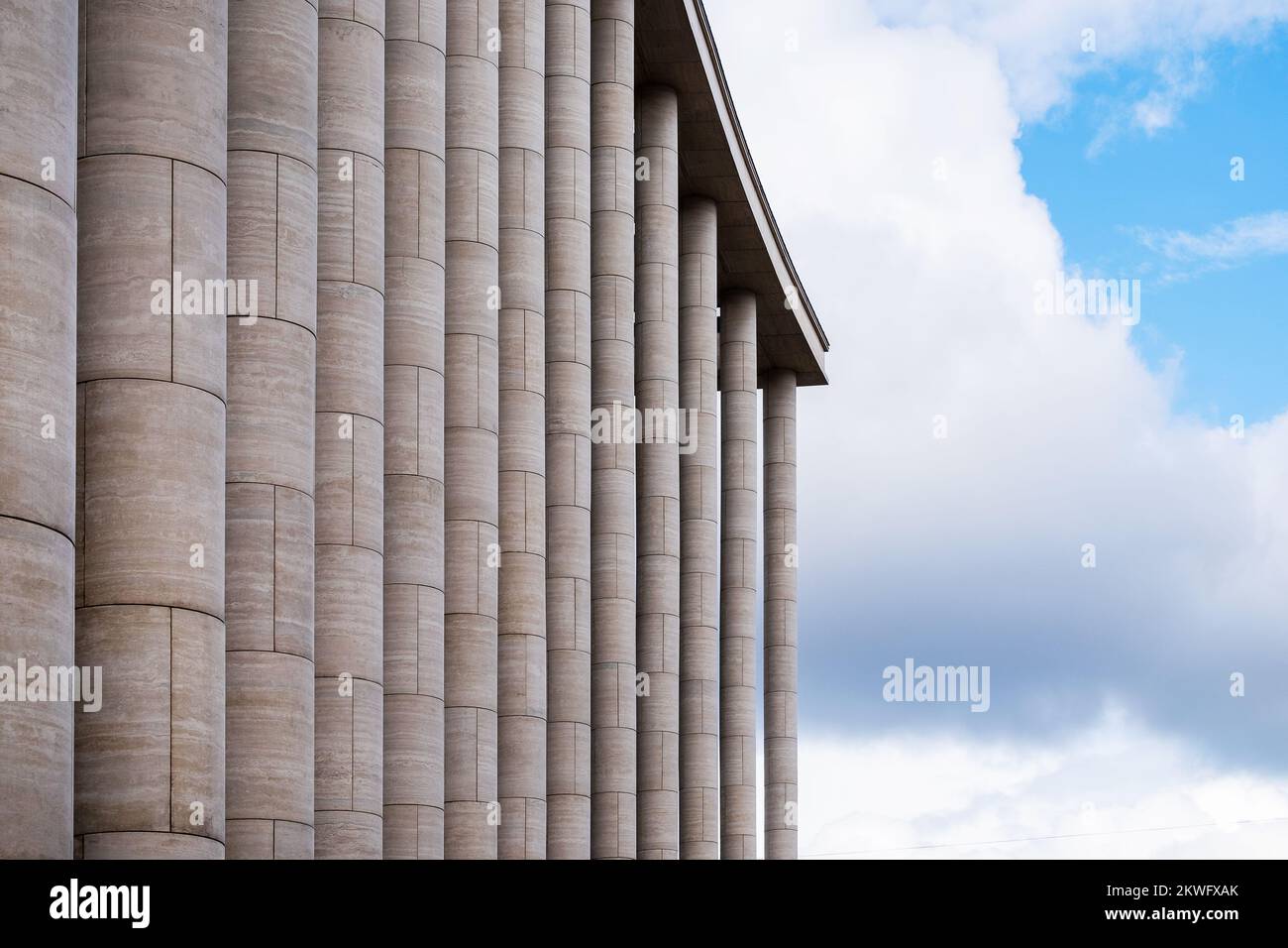 Fragment of the facade of a modern building with architectural columns ...