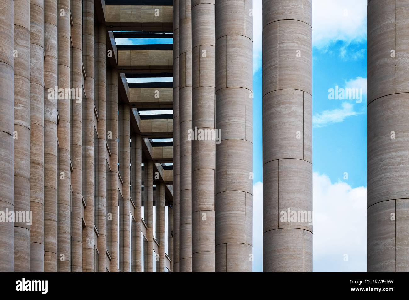 Fragment of the facade of a modern building with architectural columns ...