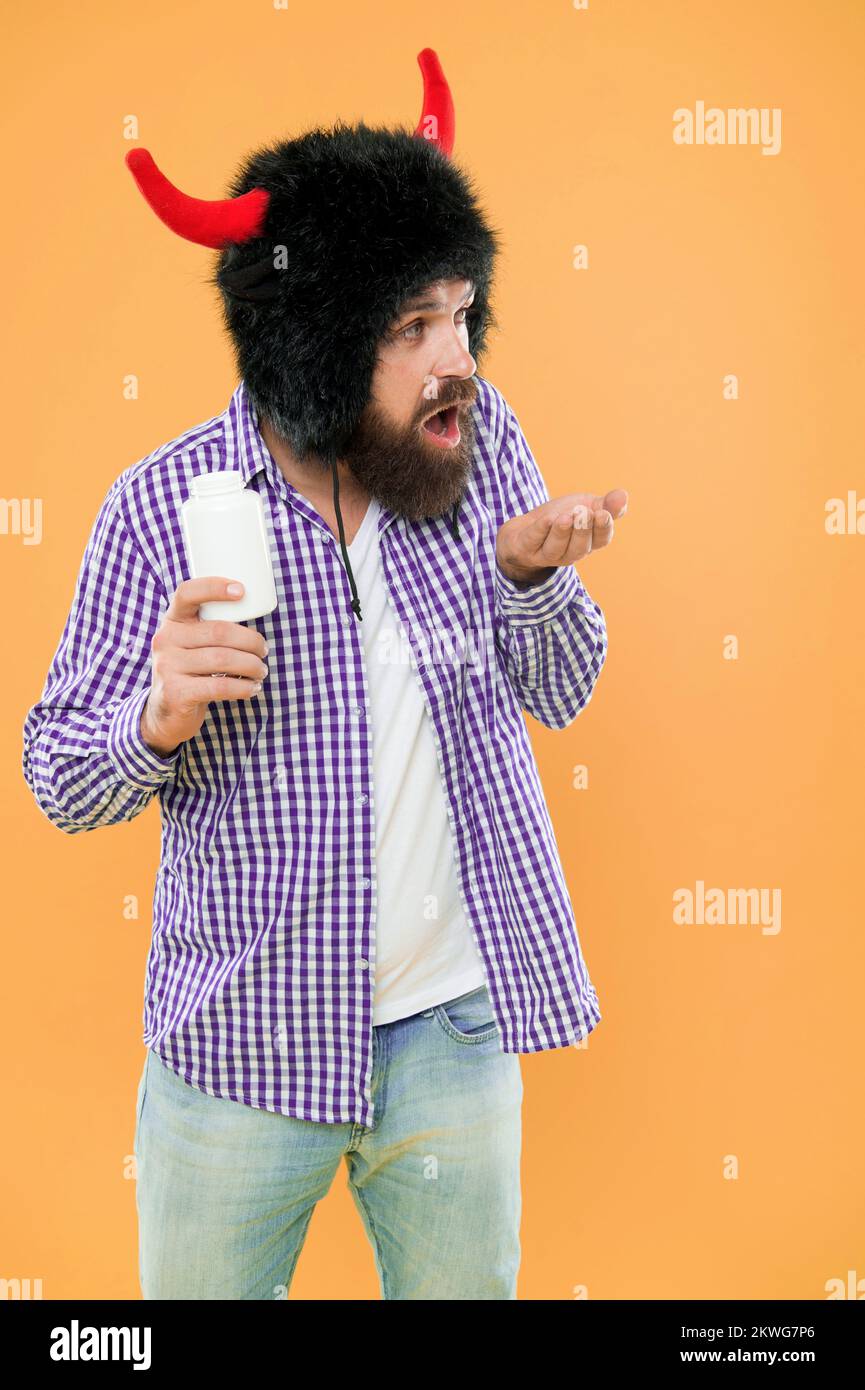 Taking proper medication. Sick bearded man take pill. Prescribed ...