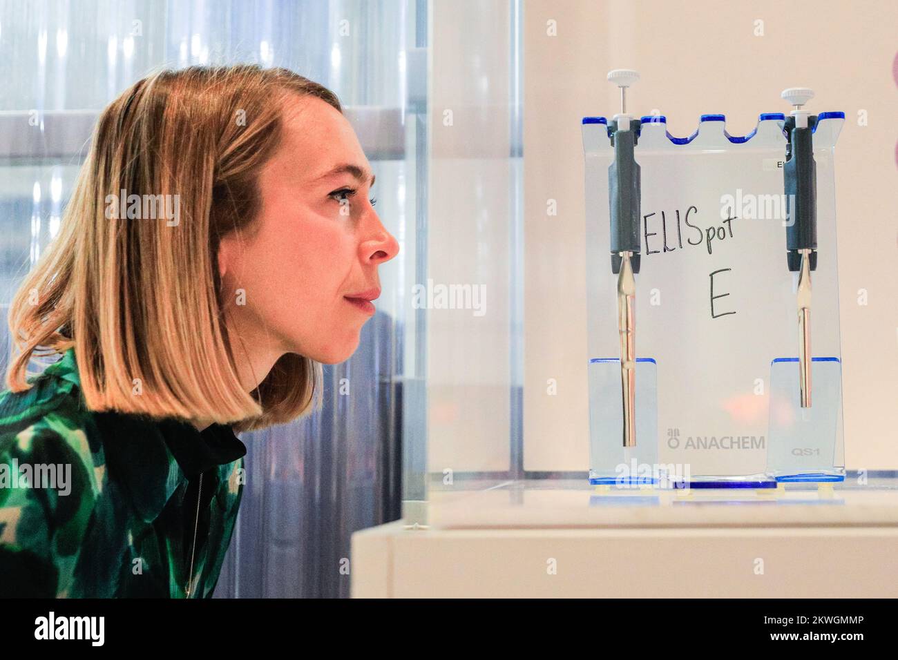 London, UK. 30th Nov, 2022. Museum staff pose with pipettes and test ...