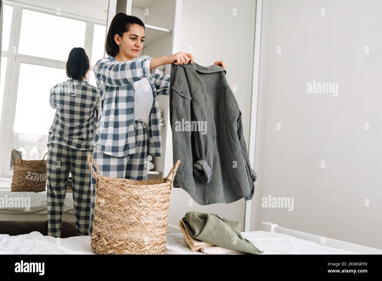 Woman wearing white pajama hi-res stock photography and images - Alamy