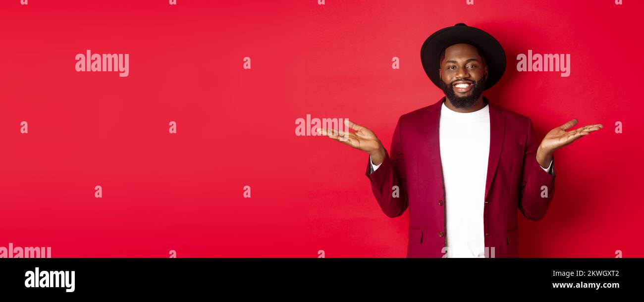 Christmas shopping and people concept. Handsome african american man ...
