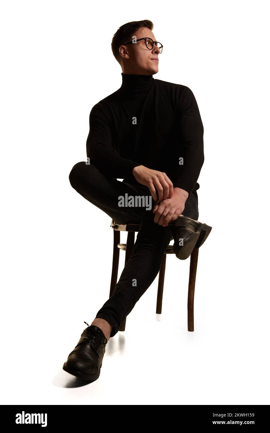 Leader. Portrait of stylish handsome businessman in total black outfit ...