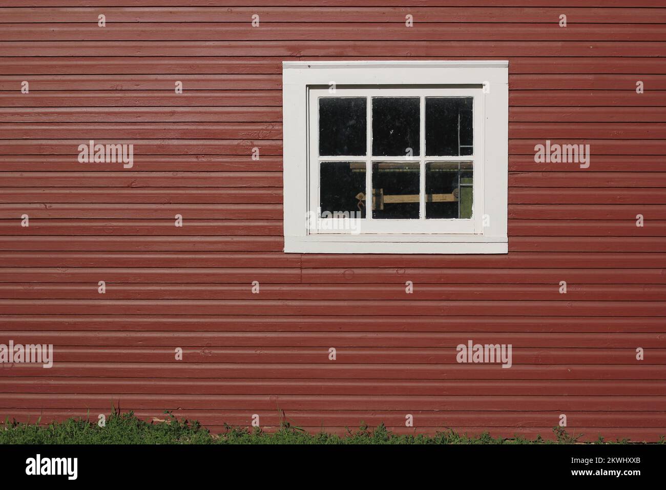 A white window set inside a typical common wall Stock Photo - Alamy