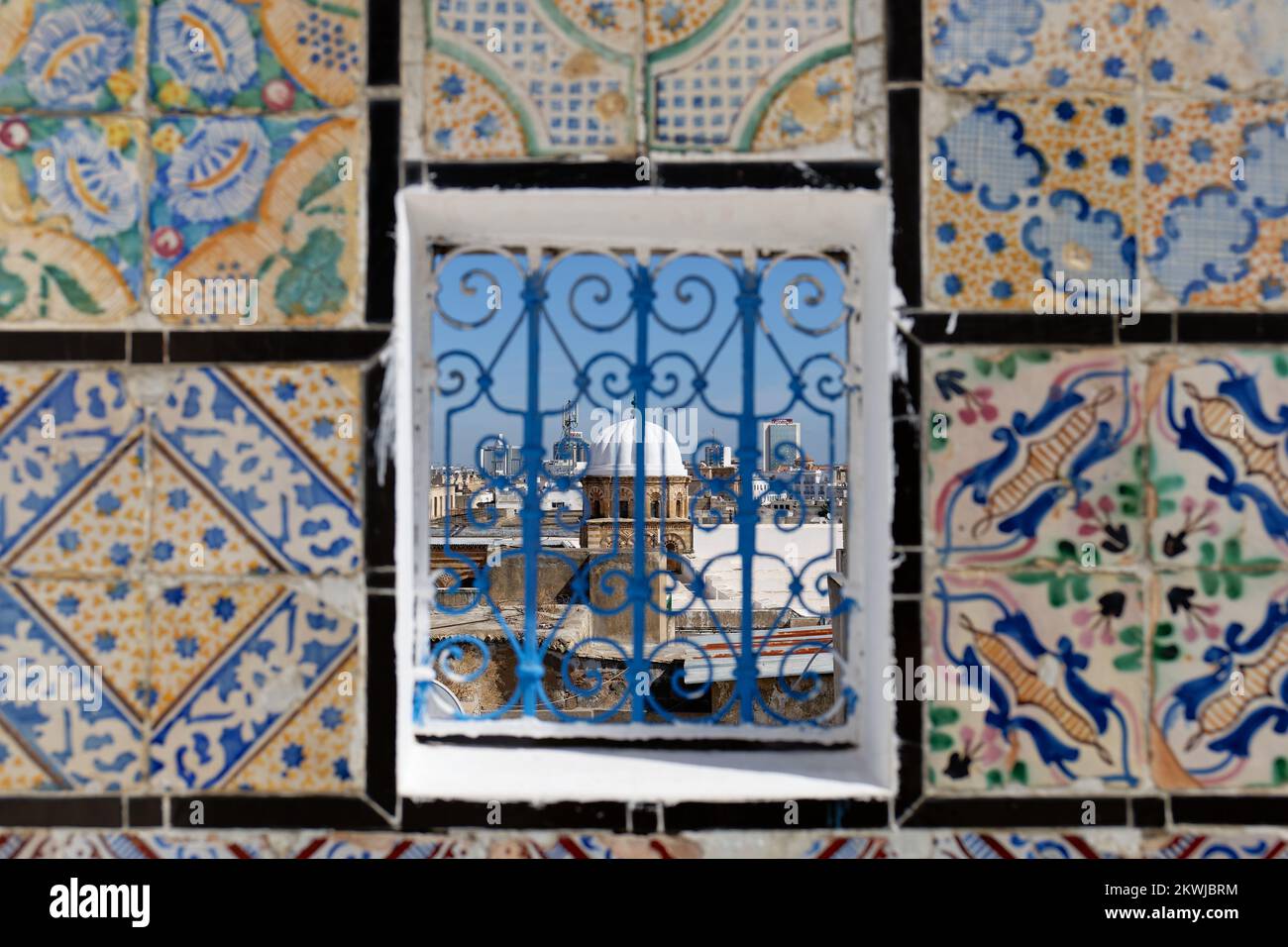 Closeup detailed shot of window with a view of the Old Medina of Tunis ...