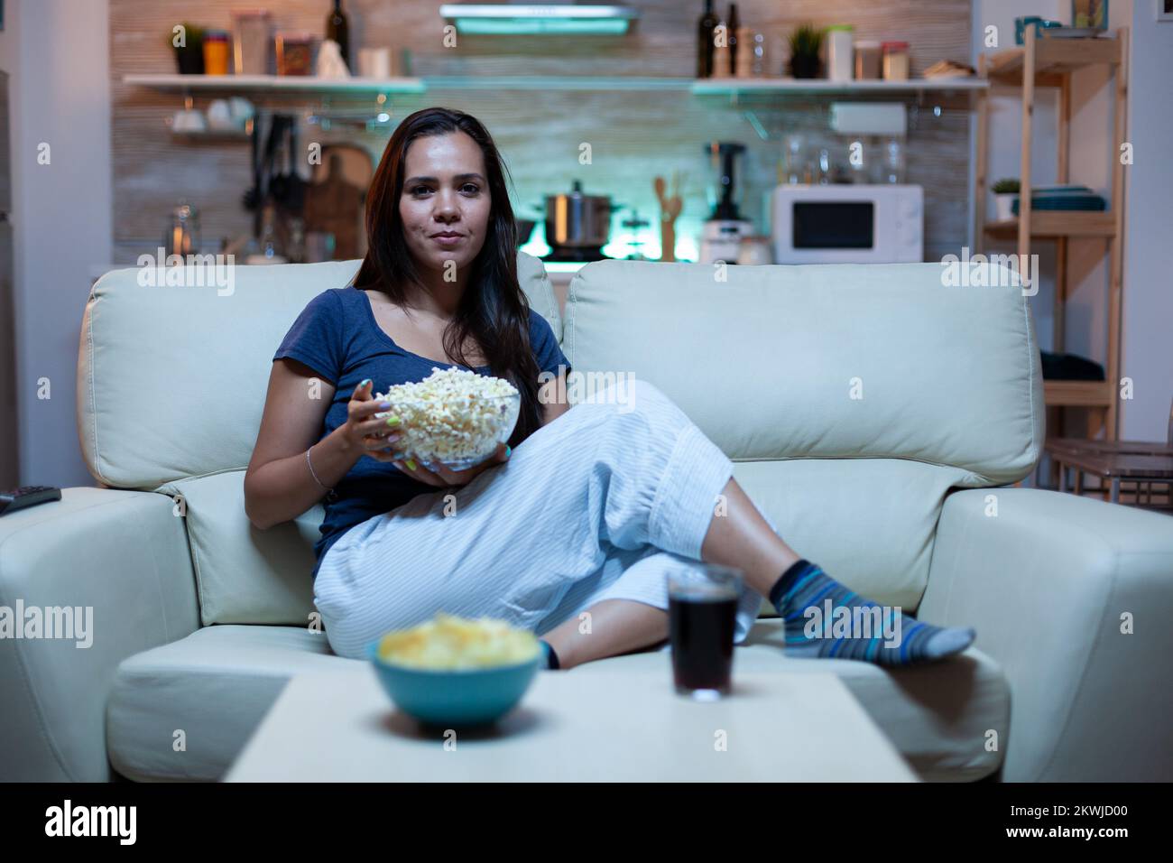 Woman alone watching comedy movie in tv hi-res stock photography and images - Alamy
