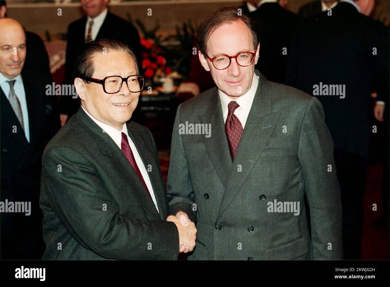 Chinese President Mr Jiang Zemin (left) shaking hands with British ...