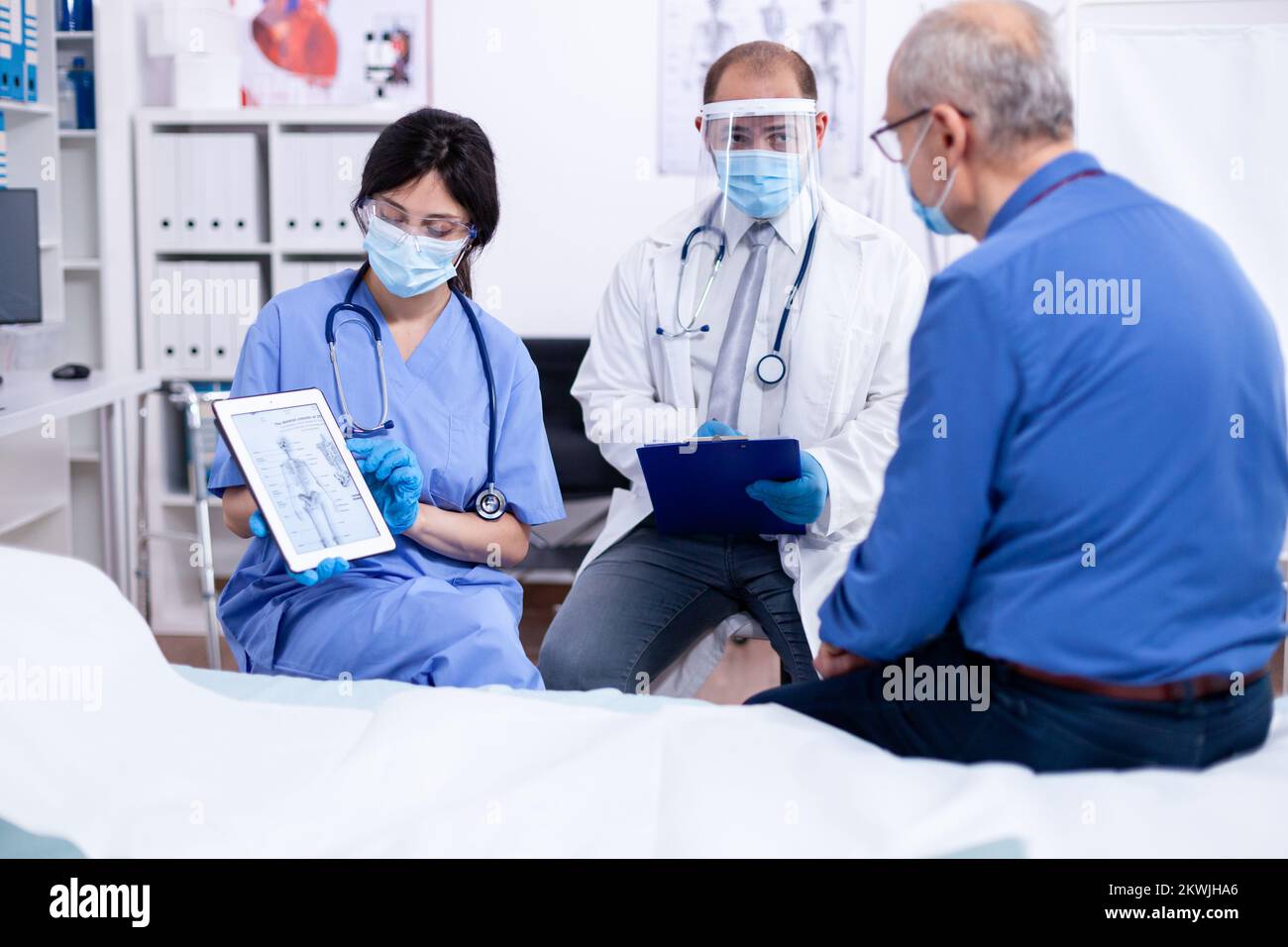 Doctor and nursewith protection mask for protection against covid-19 ...