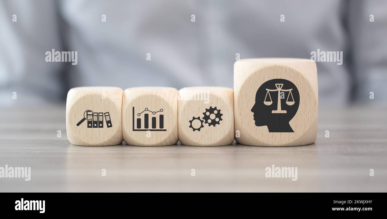 Wooden blocks with symbol of assessment concept Stock Photo - Alamy