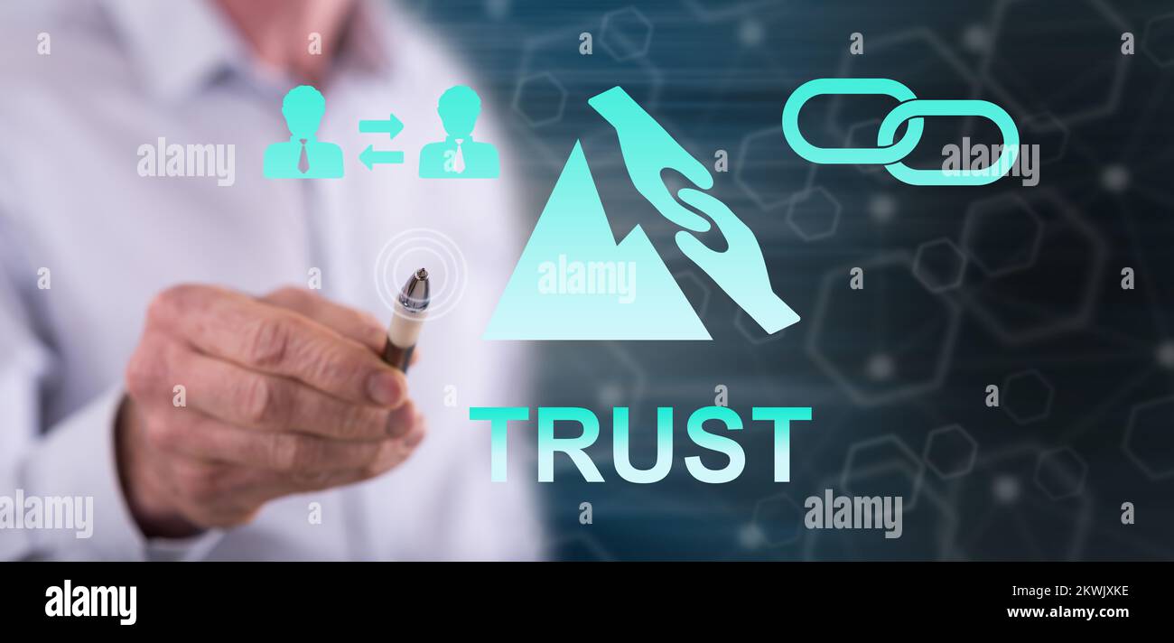 Man touching a trust concept on a touch screen with a pen Stock Photo ...