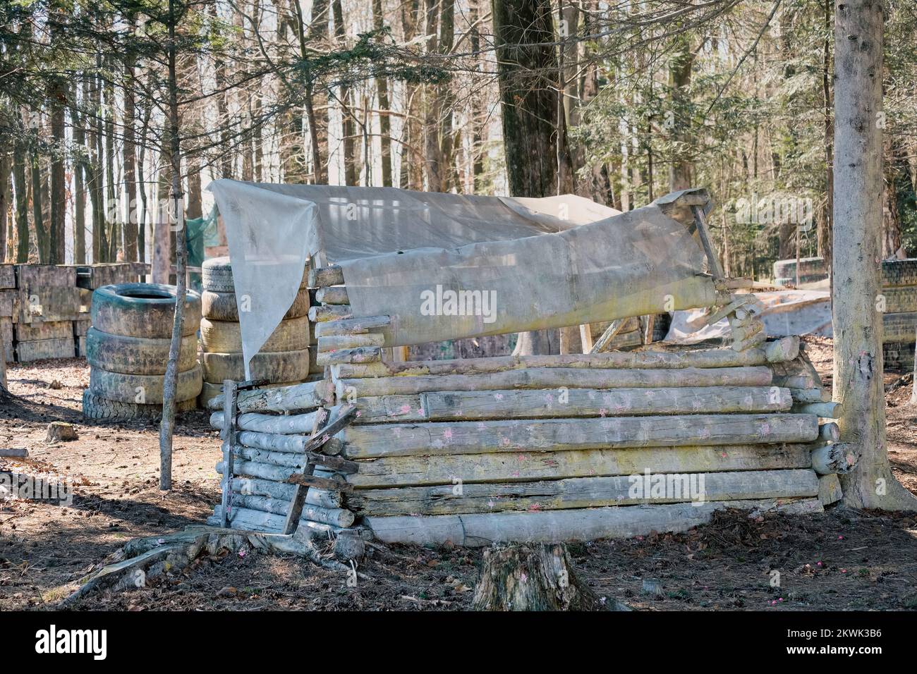 Shelter behind a wooden wall - a bunker in the paintball arena, a ...