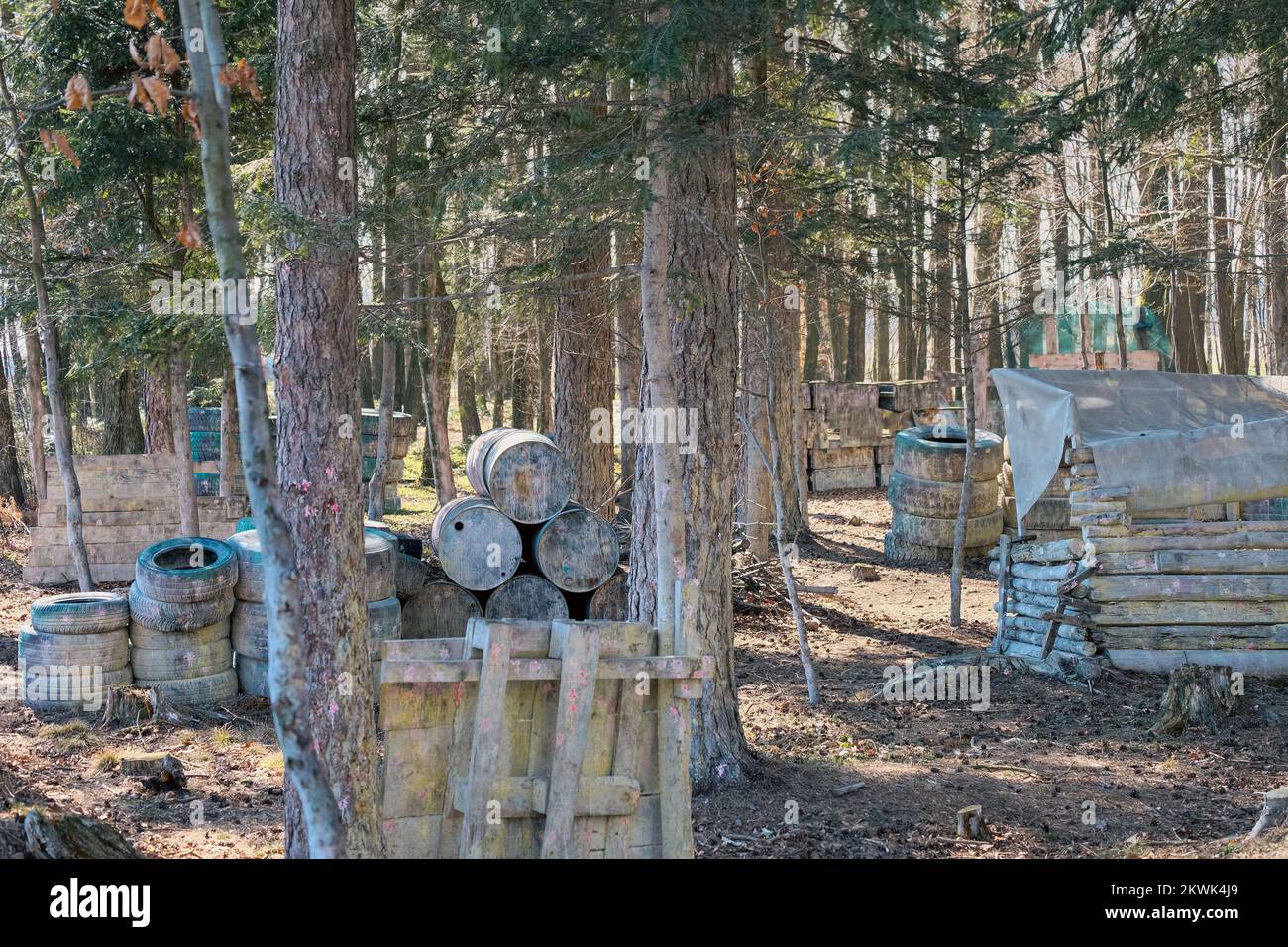 Metal barrels in the forest during the game, cover and shelter in ...