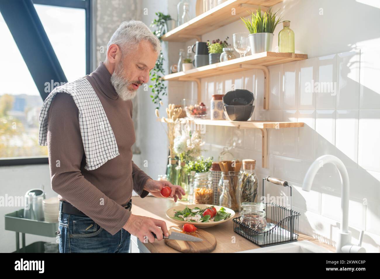 Bearded man cooking in hi-res stock photography and images - Alamy