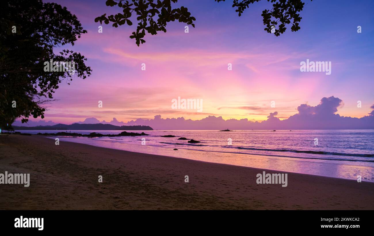 sunset at the beach of Khao Lak Thailand Stock Photo - Alamy