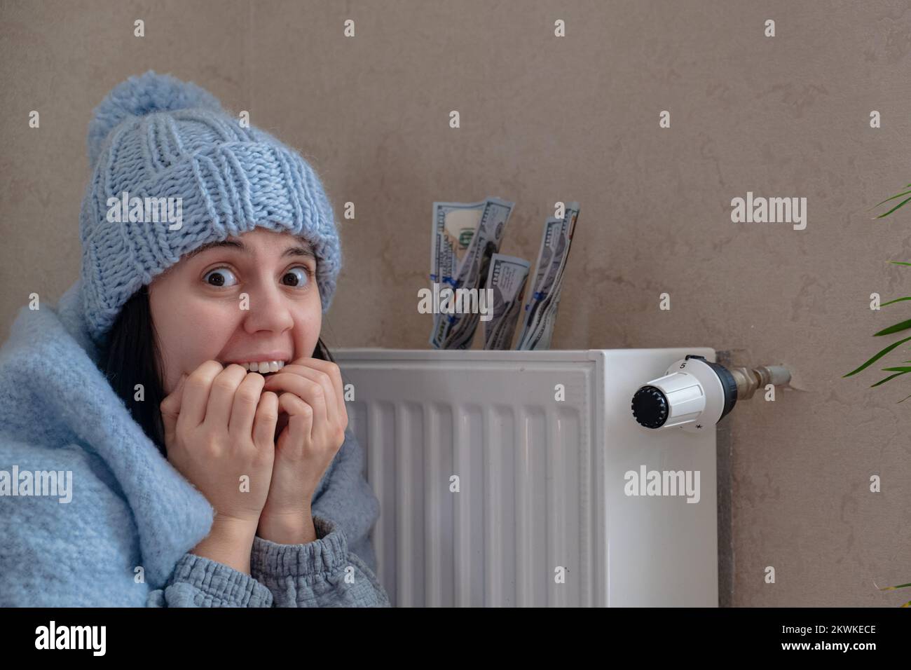 the woman is afraid that the cost of heat is rising. concept Stock ...