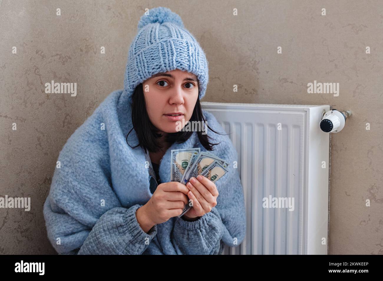 Woman sitting on radiator hi-res stock photography and images - Alamy