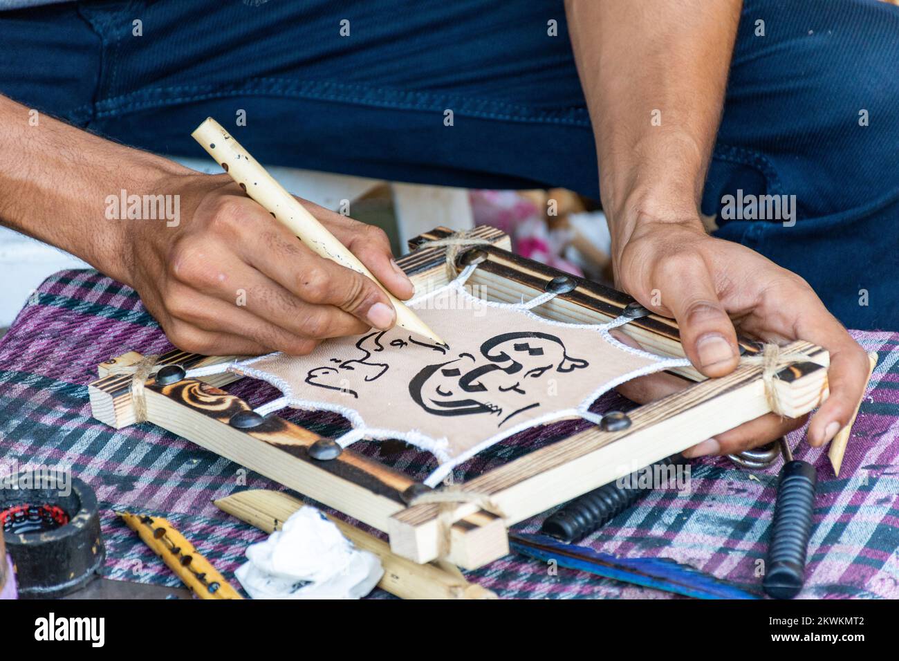 Arabic calligraphy artist hi-res stock photography and images - Alamy