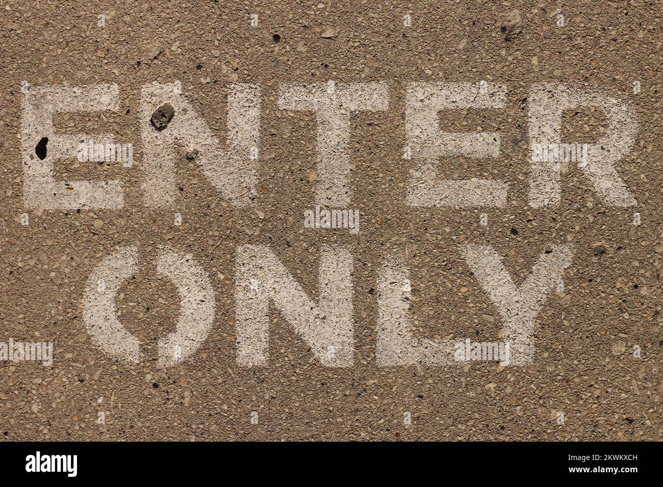 Sign spray painted on pavement hi-res stock photography and images - Alamy