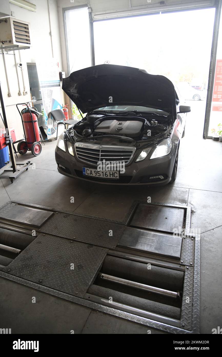 Sofia, Bulgaria - Nov 7 2022: A car in front of a roller brake test ...