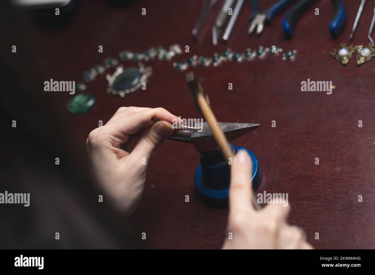 Close up jewelry hammer concept photo Stock Photo - Alamy