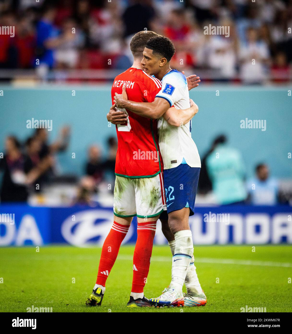 Doha, Qatar. 29th Nov, 2022. Chris Mepham (Wales) Jude Bellingham ...