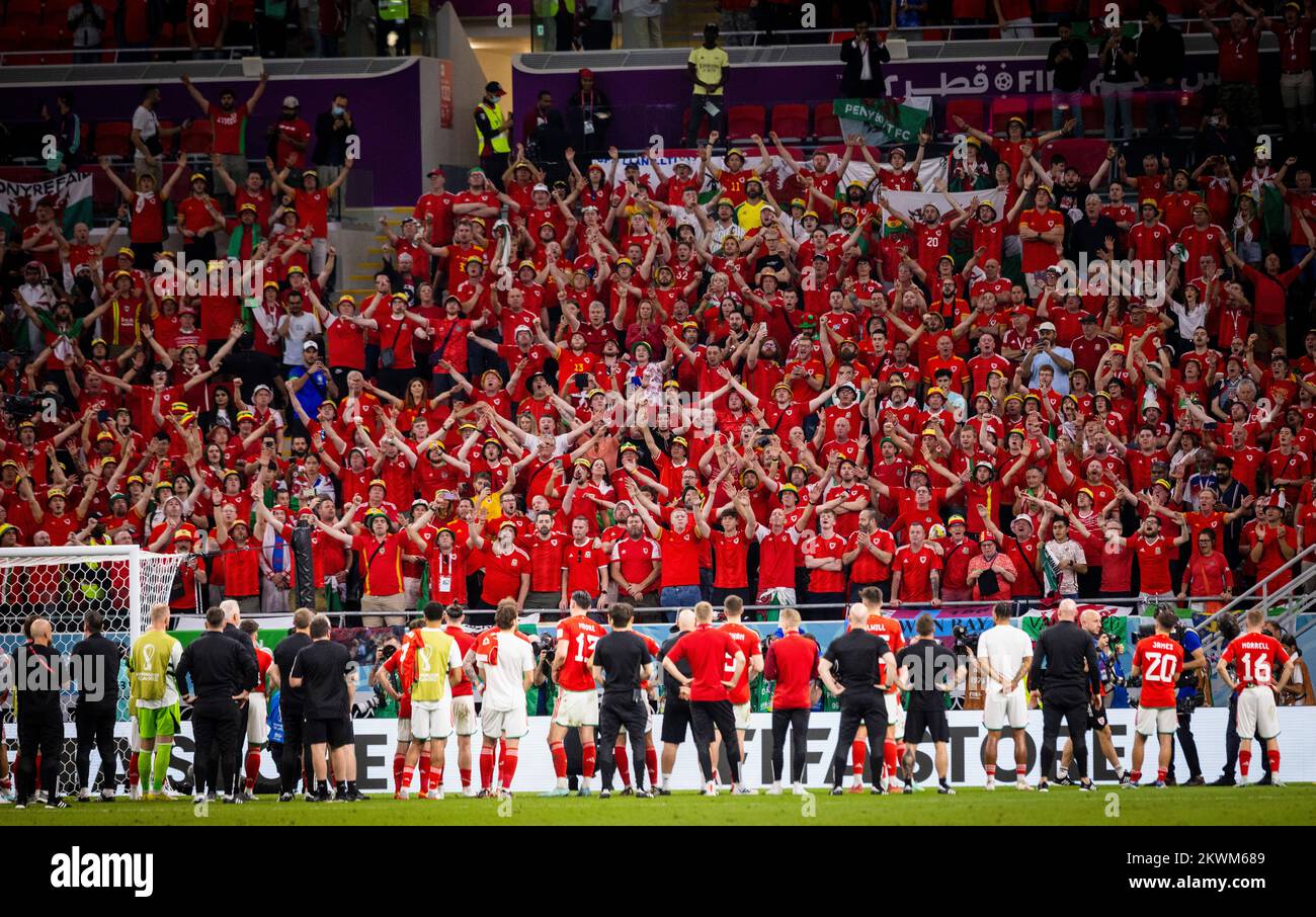 Doha, Qatar. 29th Nov, 2022. Welsh fans celebrate their team despite ...