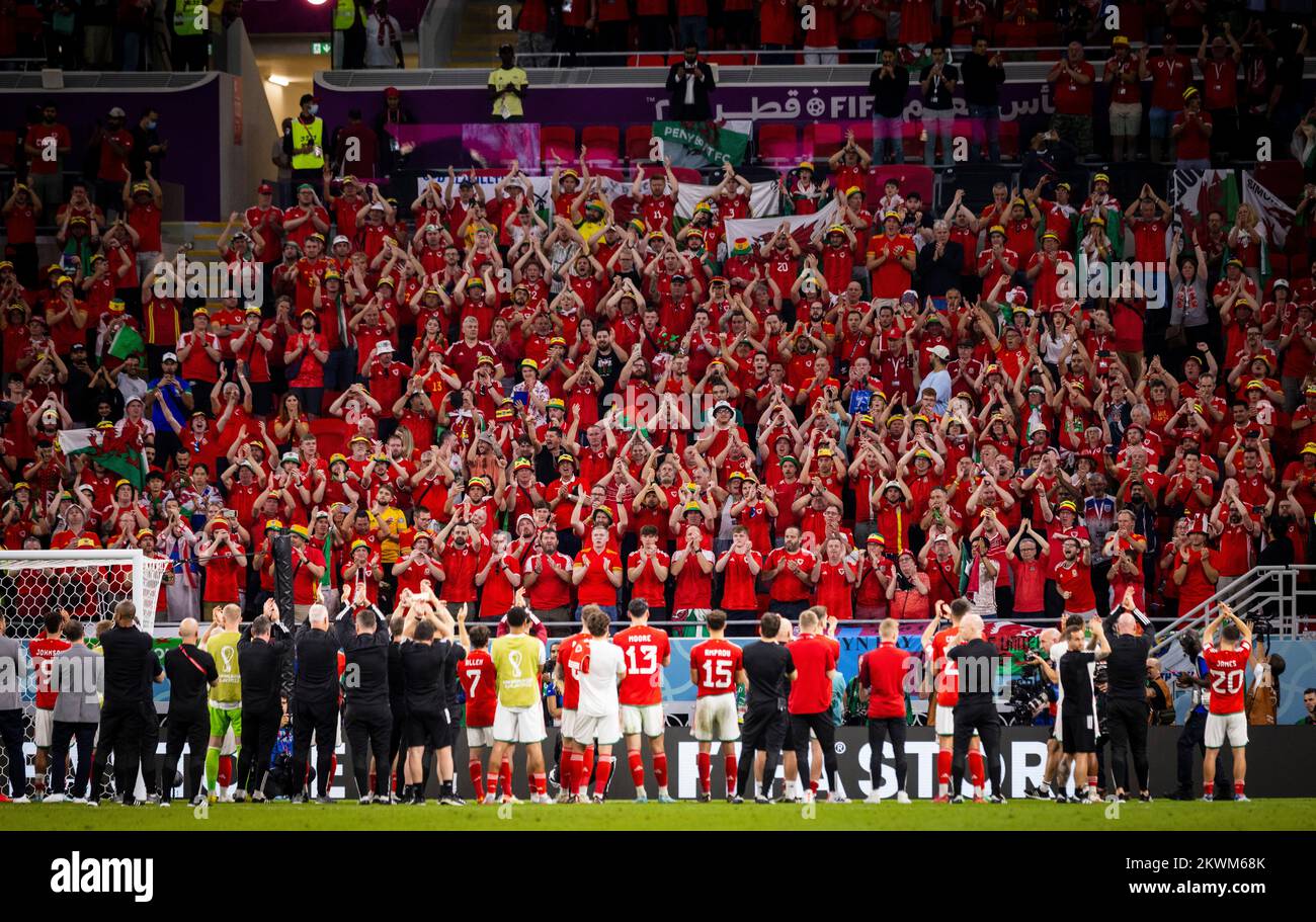 Doha, Qatar. 29th Nov, 2022. Welsh fans celebrate their team despite ...