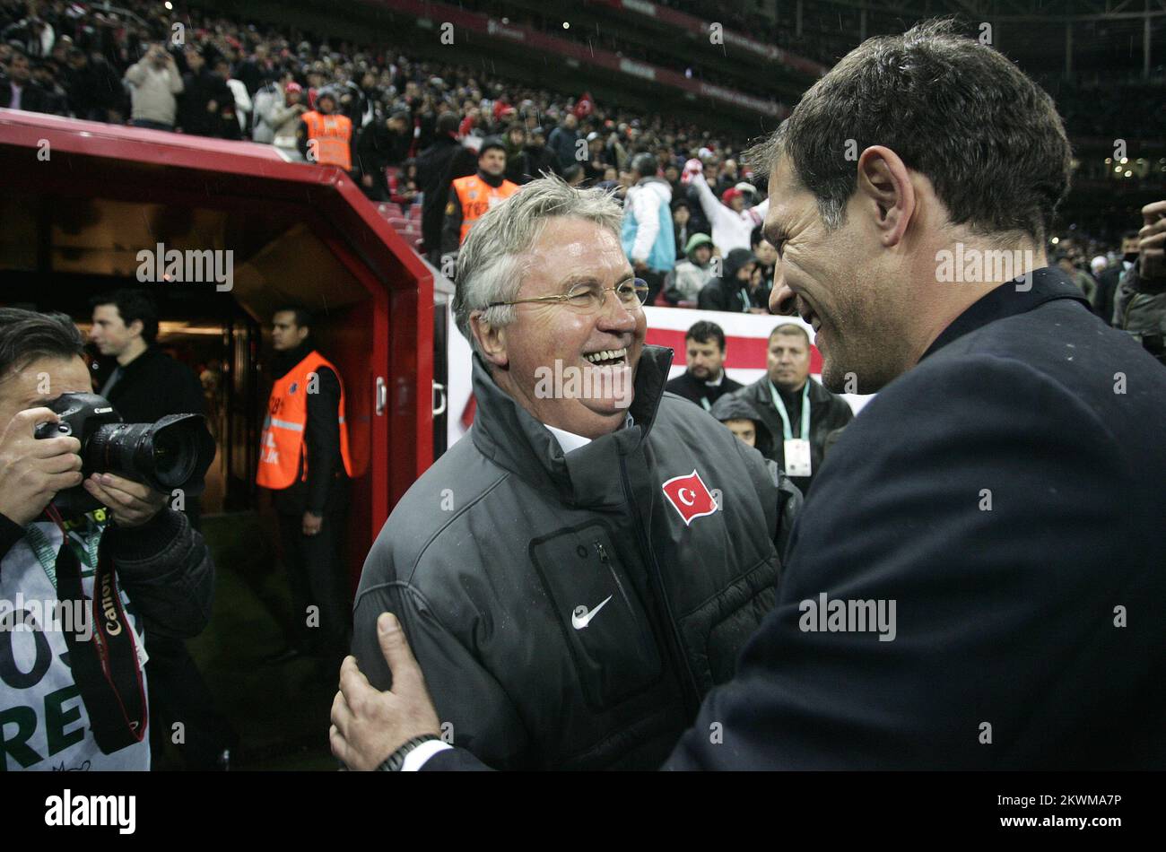 Turkey coach Guus Hiddink (left) and Croatia coach Slaven Bilic embrace ...