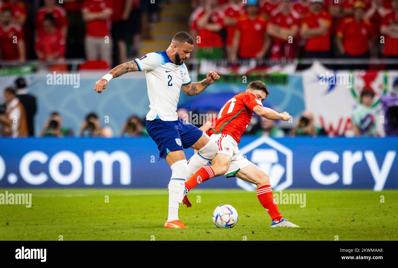 Doha, Qatar. 29th Nov, 2022. Kyle Walker (England), Daniel James (Wales ...