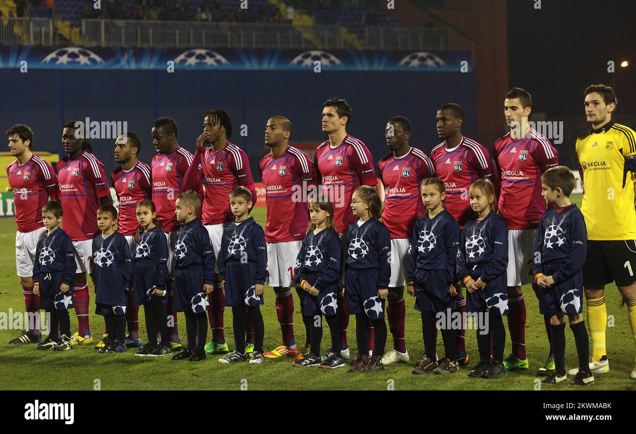 Lyon players line up with mascots prior to kick-off. Photo: Igor Kralj ...