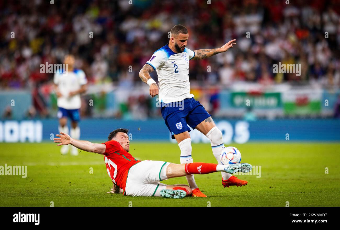 Doha, Qatar. 29th Nov, 2022. Kieffer Moore (Wales), Kyle Walker ...