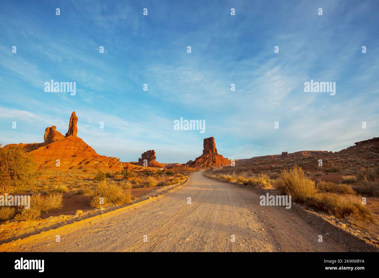 Valley of the Gods rock formation with Monument Valley at sunrise Stock ...